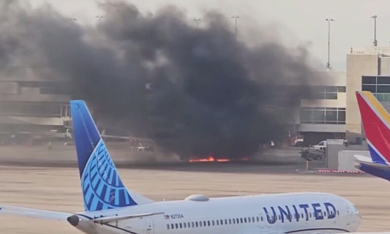 American Airlines plane catches fire at Denver airport, at least 12 ...