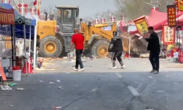 Bulldozer crashes into market in Beijing; casualties unclear amid ...